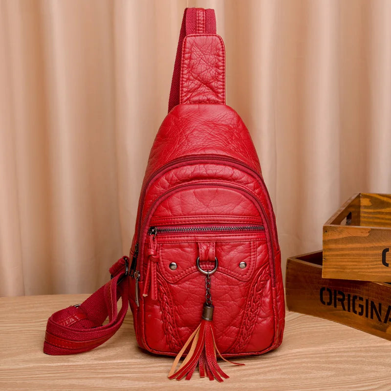 Chic Red Leather Sling Backpack With Tassel Detail on Luulla